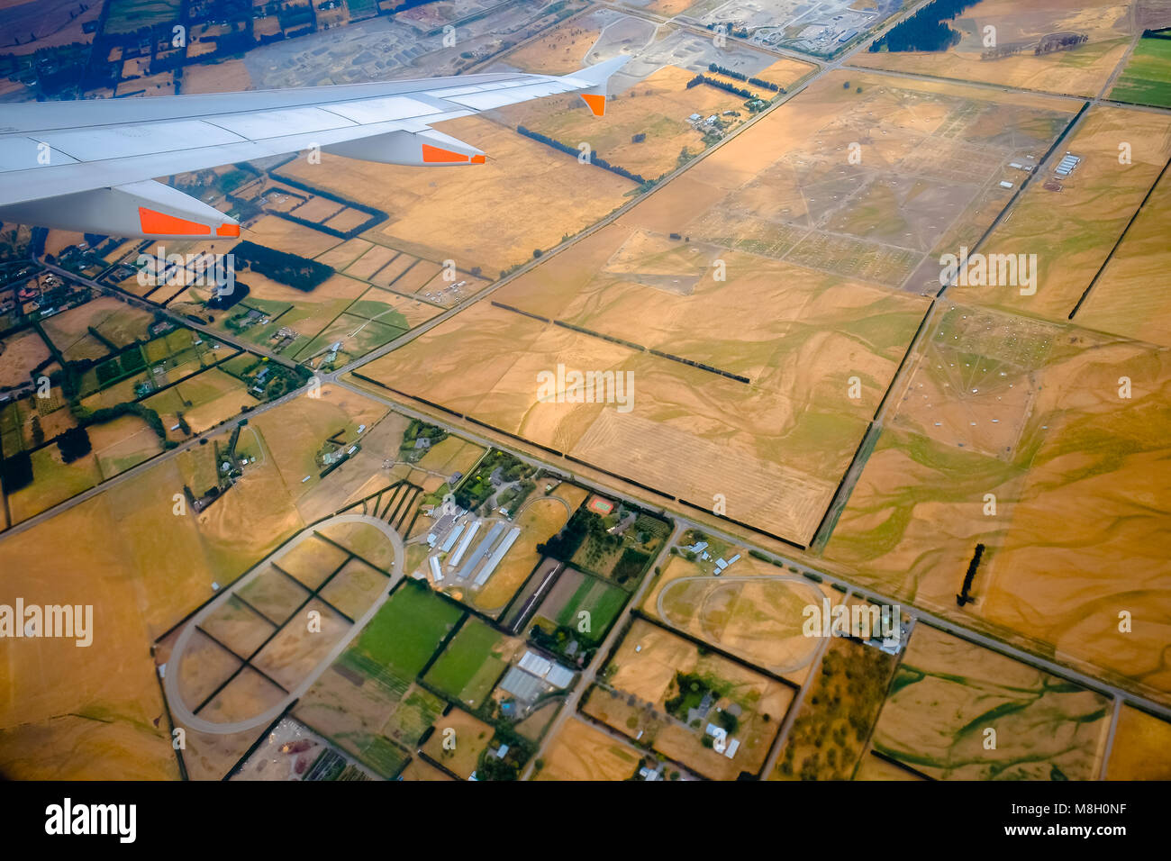 Beautiful landscape green field views from an airplane window during ...