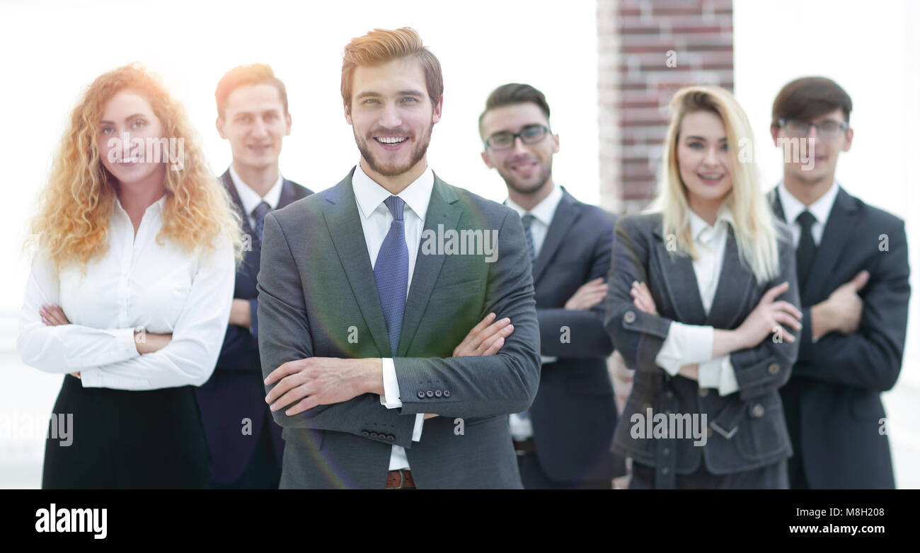 leader and a professional business team Stock Photo - Alamy
