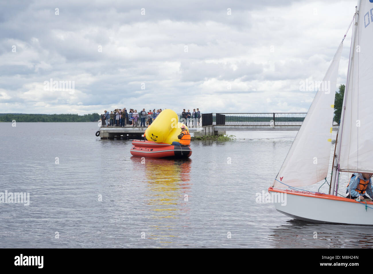 Many a group of friends sailing on a boat - summer vacation, young ...