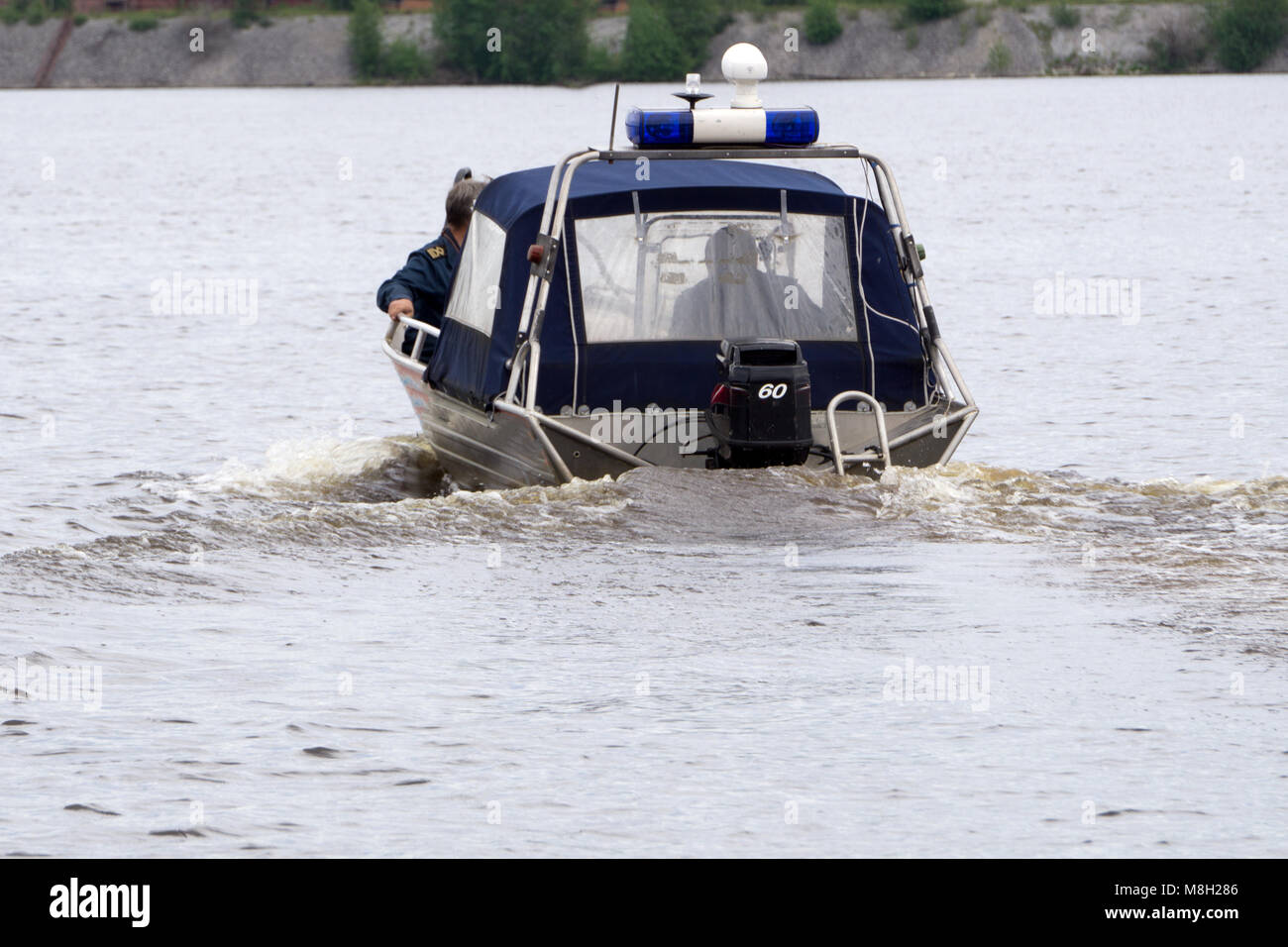 a boat with flashing lights police patrol boat at sea Stock Photo - Alamy