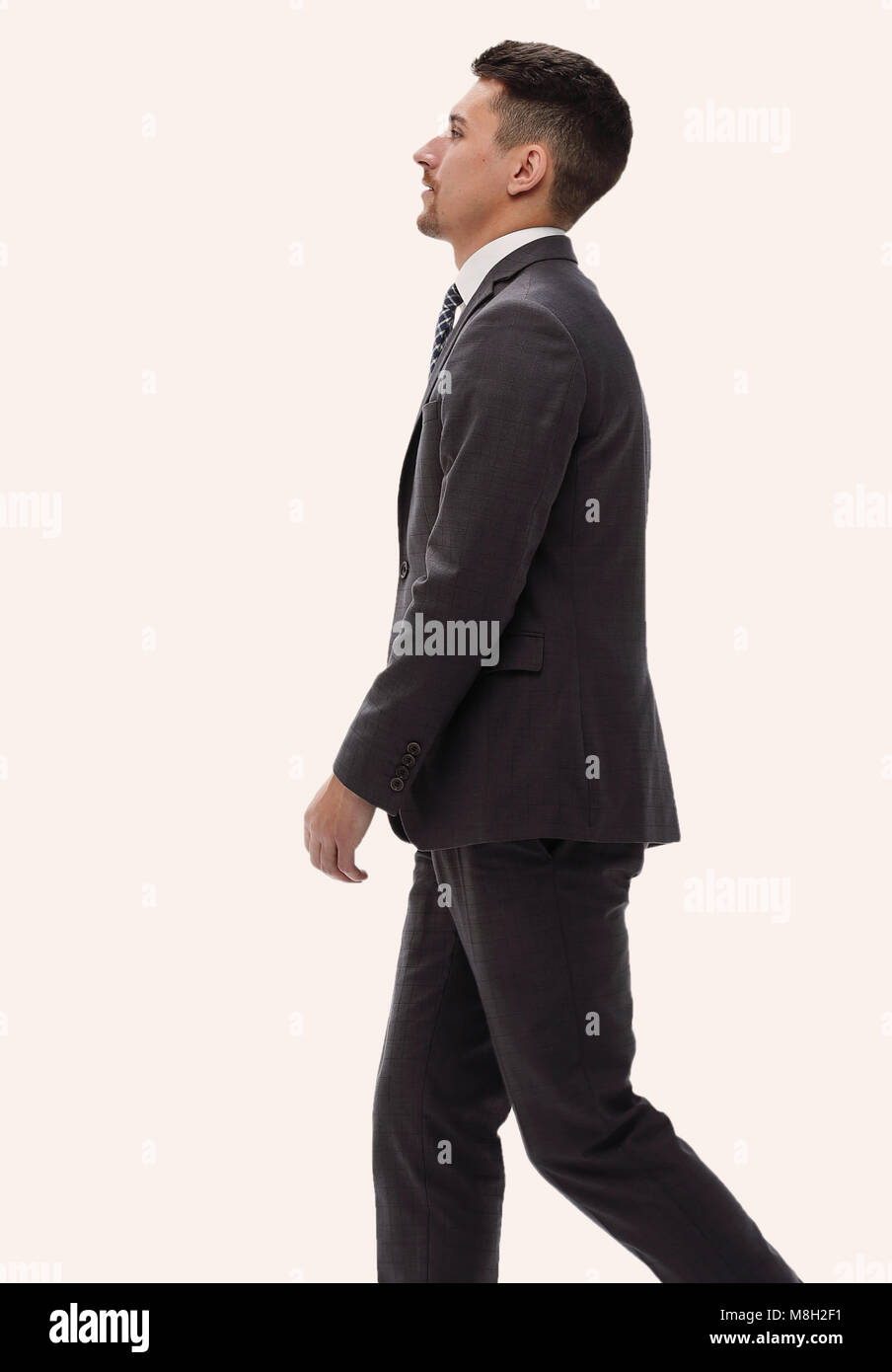 Executive businessman is moving forward confidently Stock Photo - Alamy