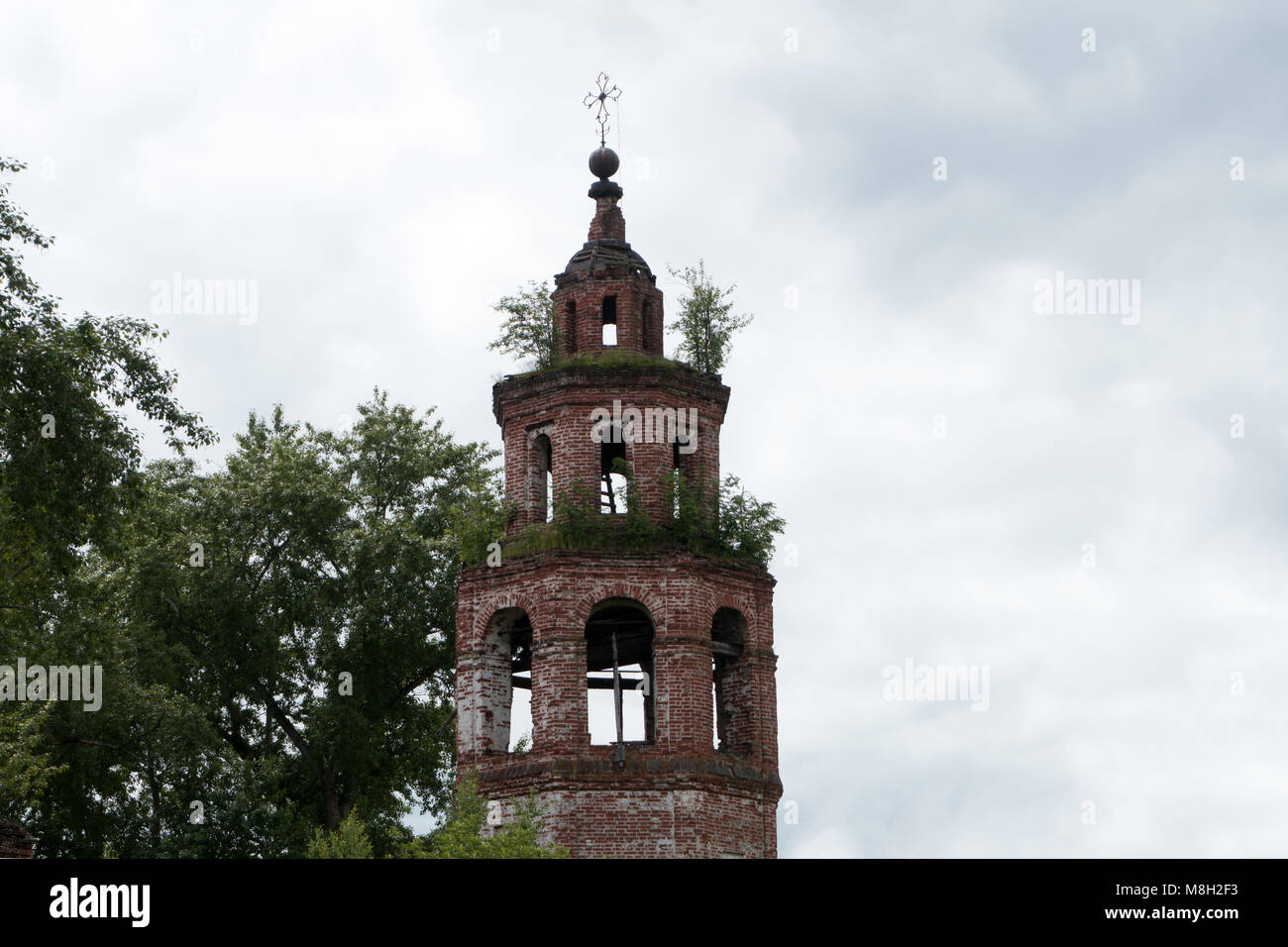 abandoned Church with no Windows and the overgrown trees around Stock ...