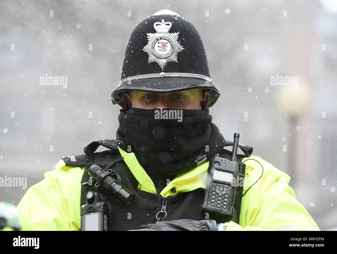 A police officer in the snow outside the scene in The Maltings ...