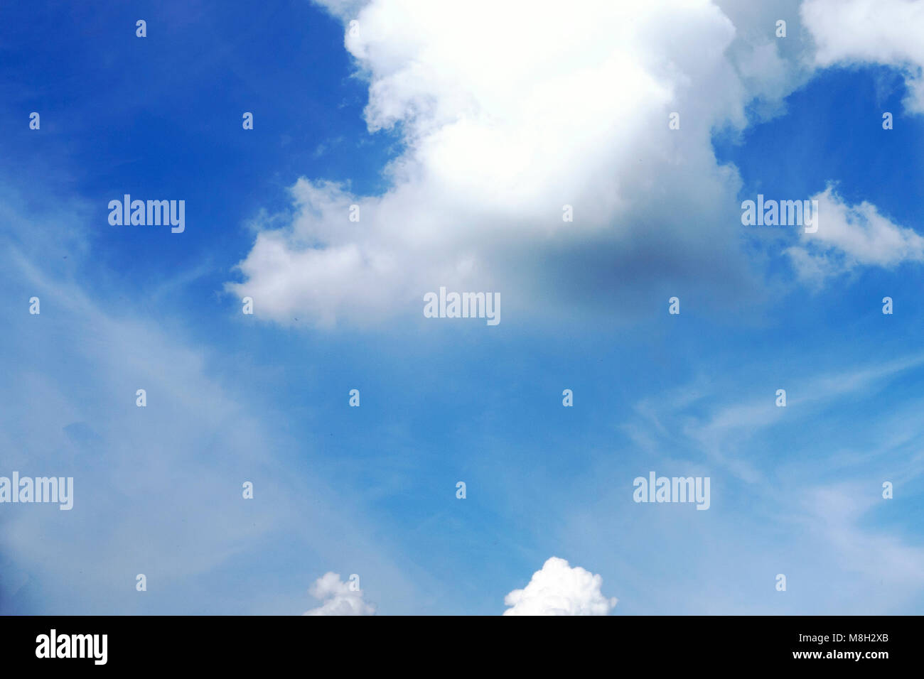 a wide sky blue sky with cloud closeup in the middle Stock Photo - Alamy