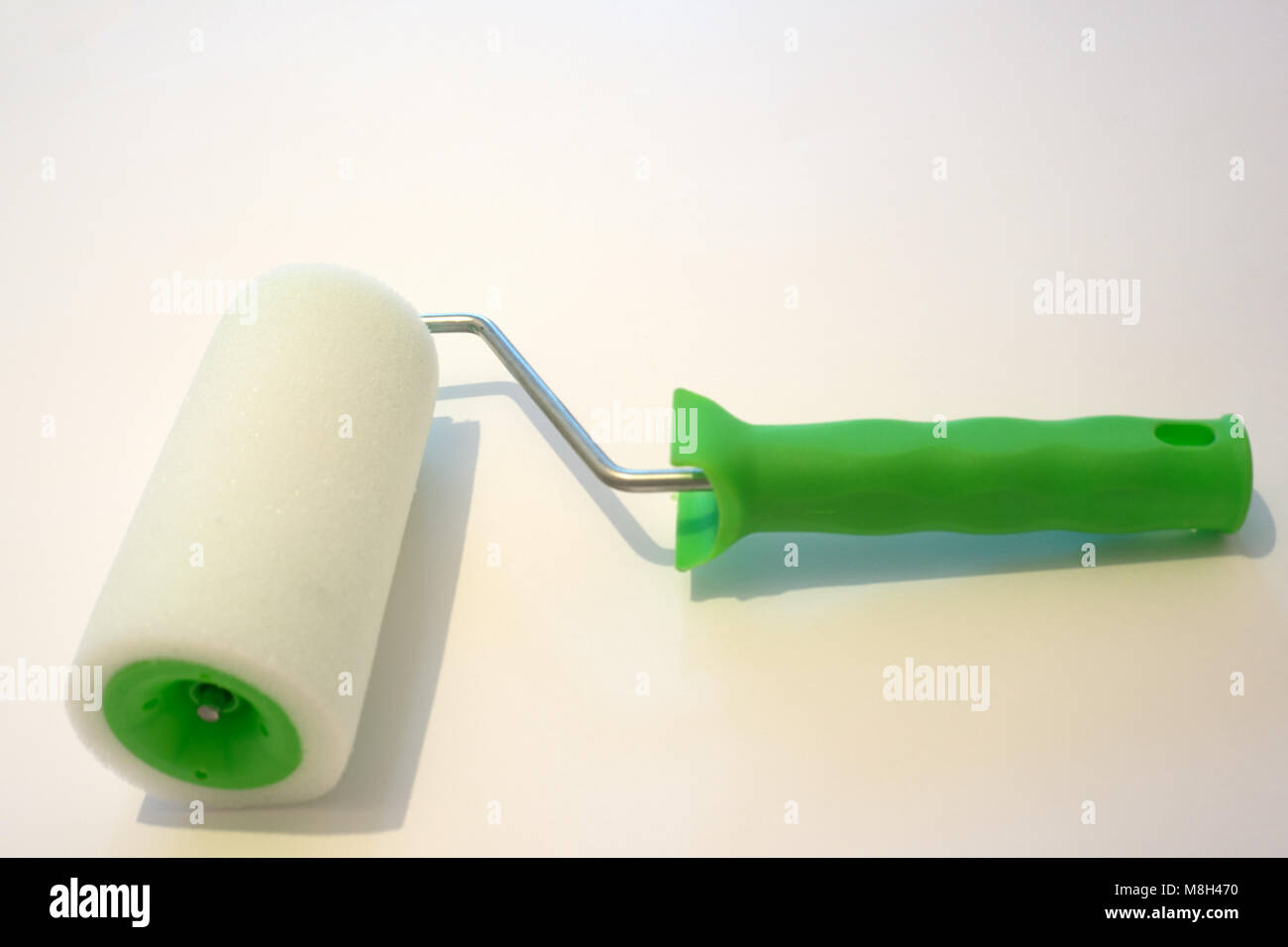 Roller for drawing. Preparation of walls for painting Stock Photo - Alamy