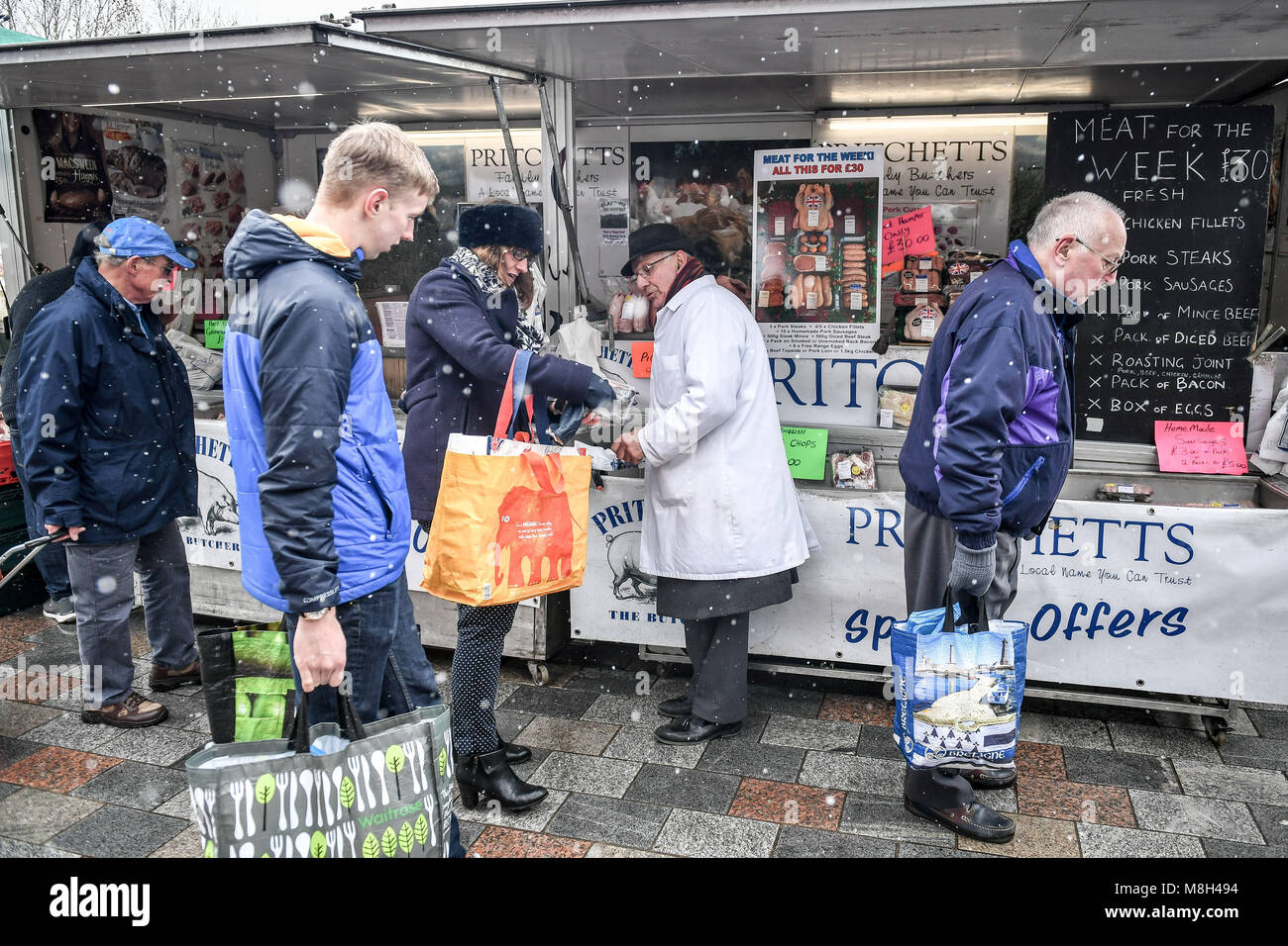 Colin Hinton serves customers at Pritchetts family butchers at the ...