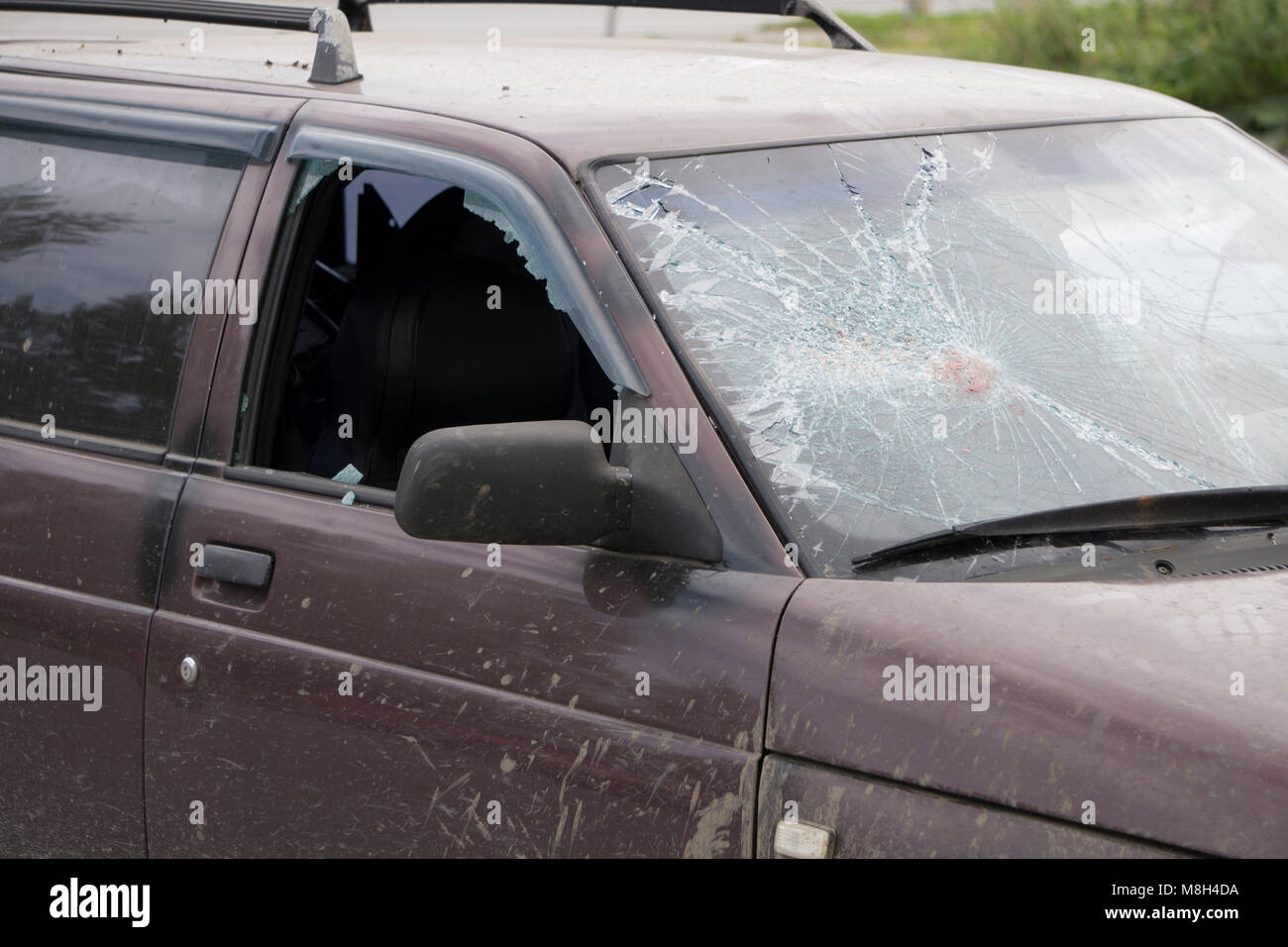 broken car glass broken right through the cracks Stock Photo - Alamy