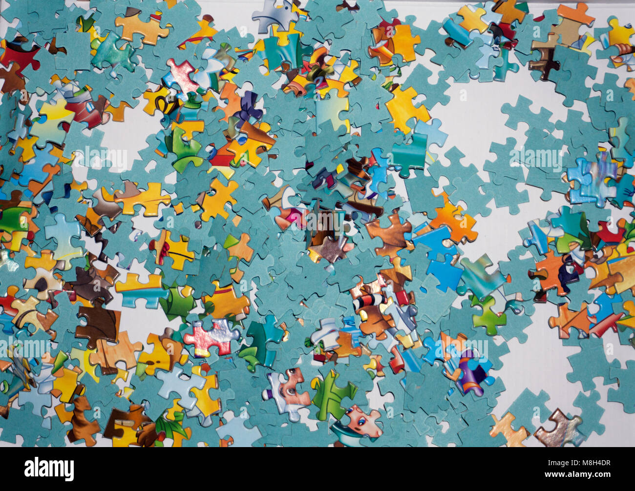 a lot of different puzzles in different colors Stock Photo - Alamy