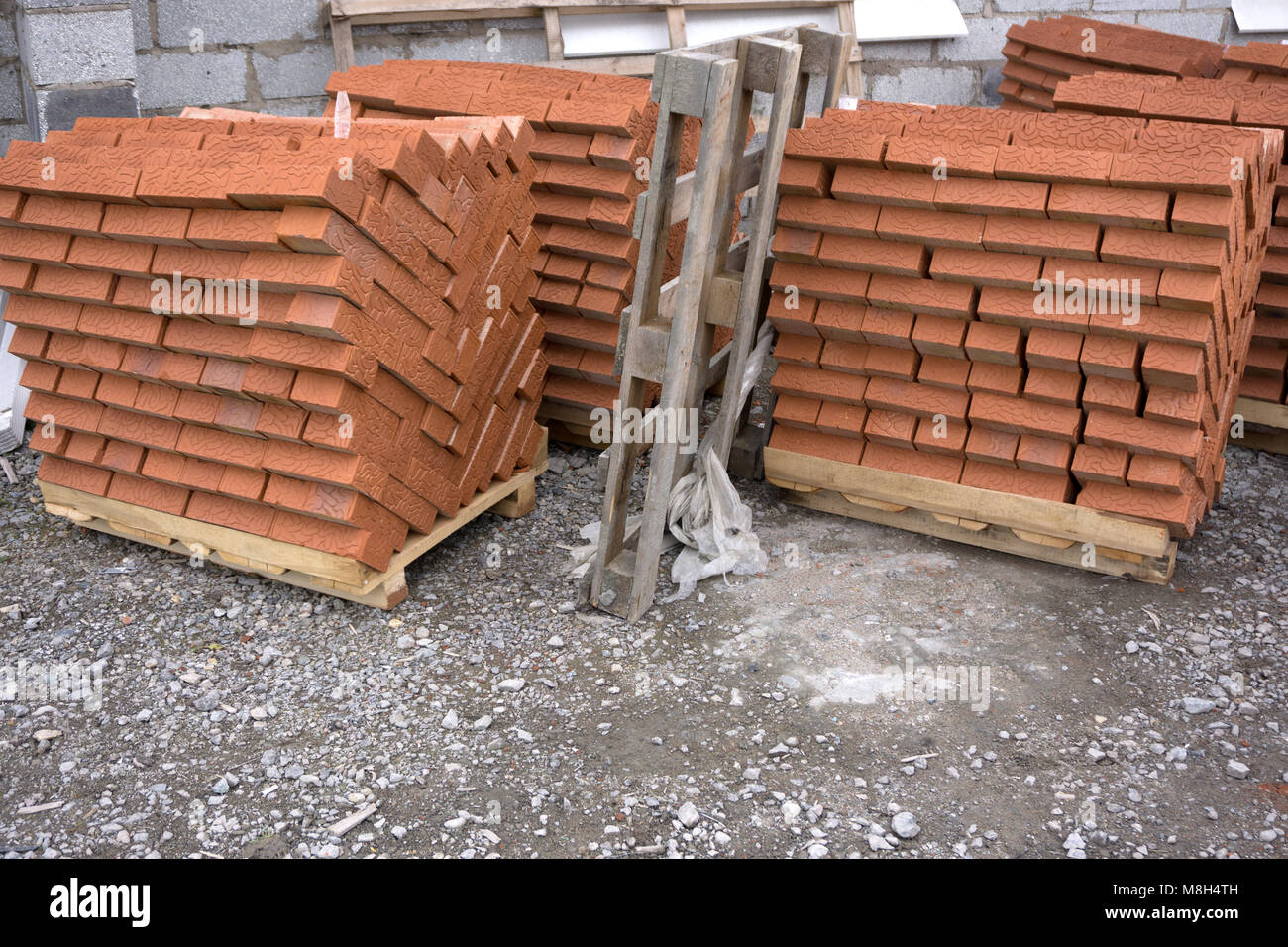 Red clay brick, standing in the stacks Stock Photo - Alamy