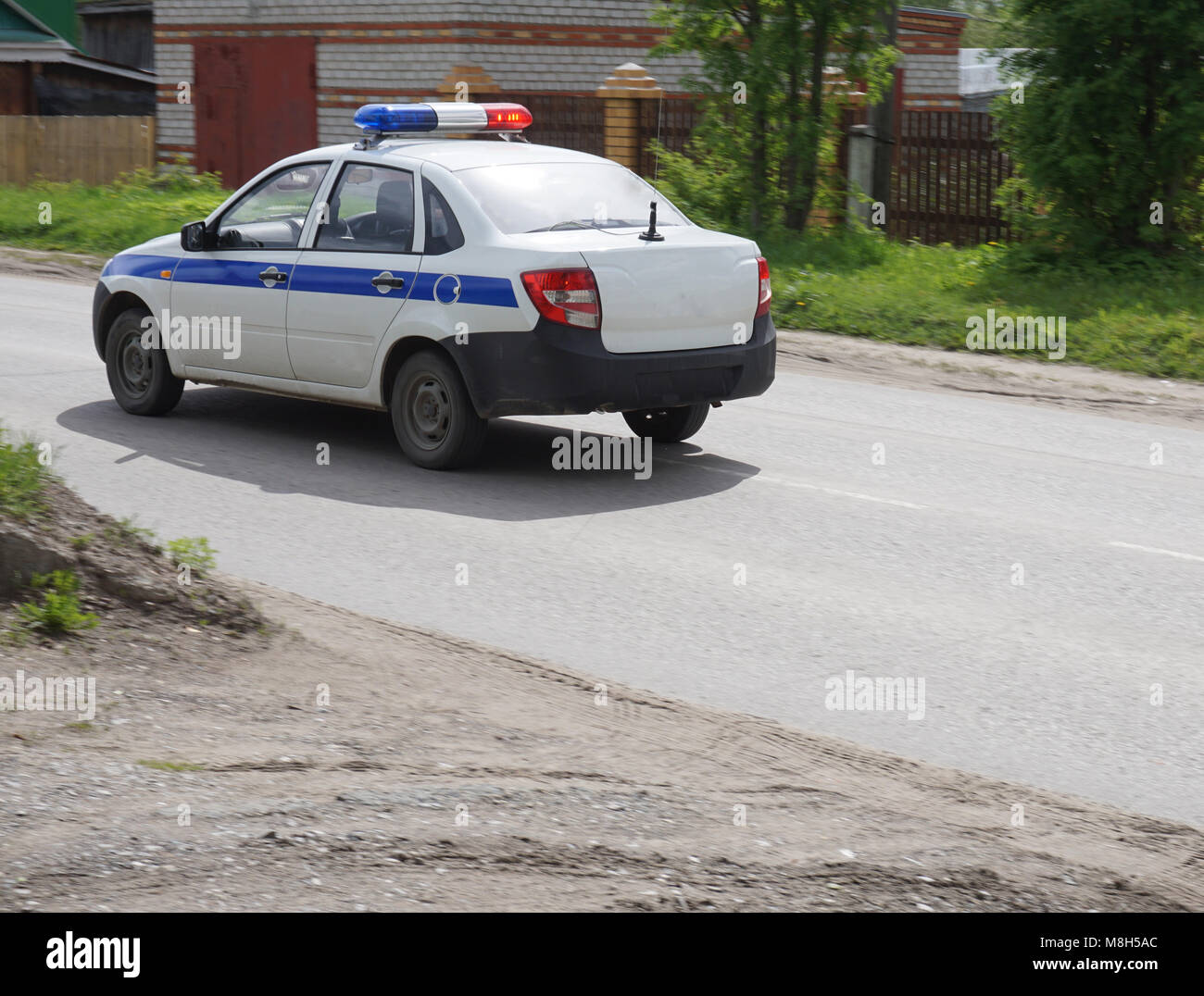 Russian police car with flashing lights Stock Photo - Alamy