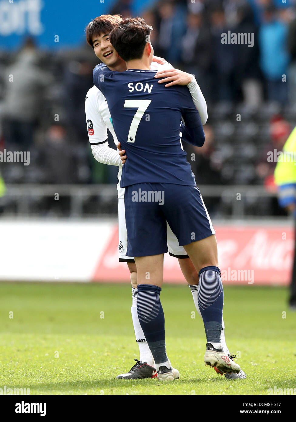 Tottenham Hotspur's Son Heung-Min and Swansea City's Ki Sung-yueng hug ...