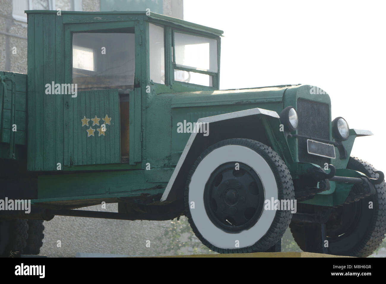 Retro lorry truck. Green color, down side. Body, silver exhaust pipe ...