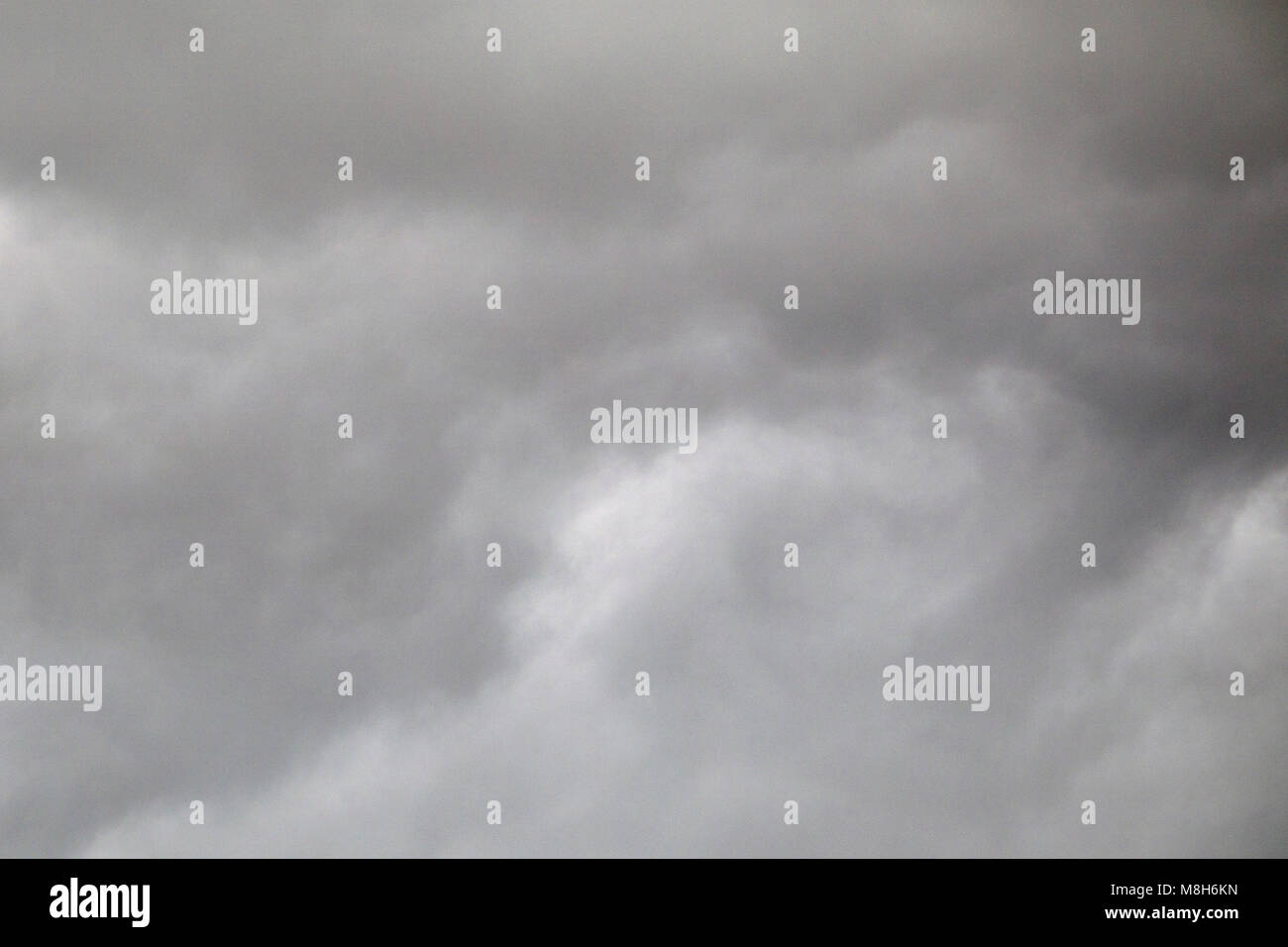 very gray Sky with lots of clouds Stock Photo - Alamy