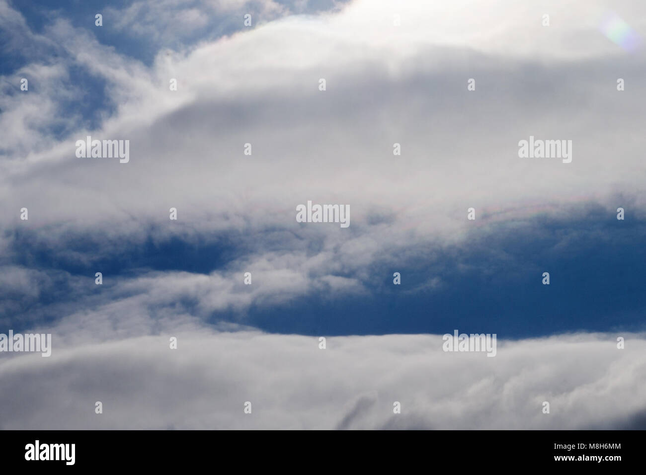 two parallel clouds blue sky Stock Photo - Alamy