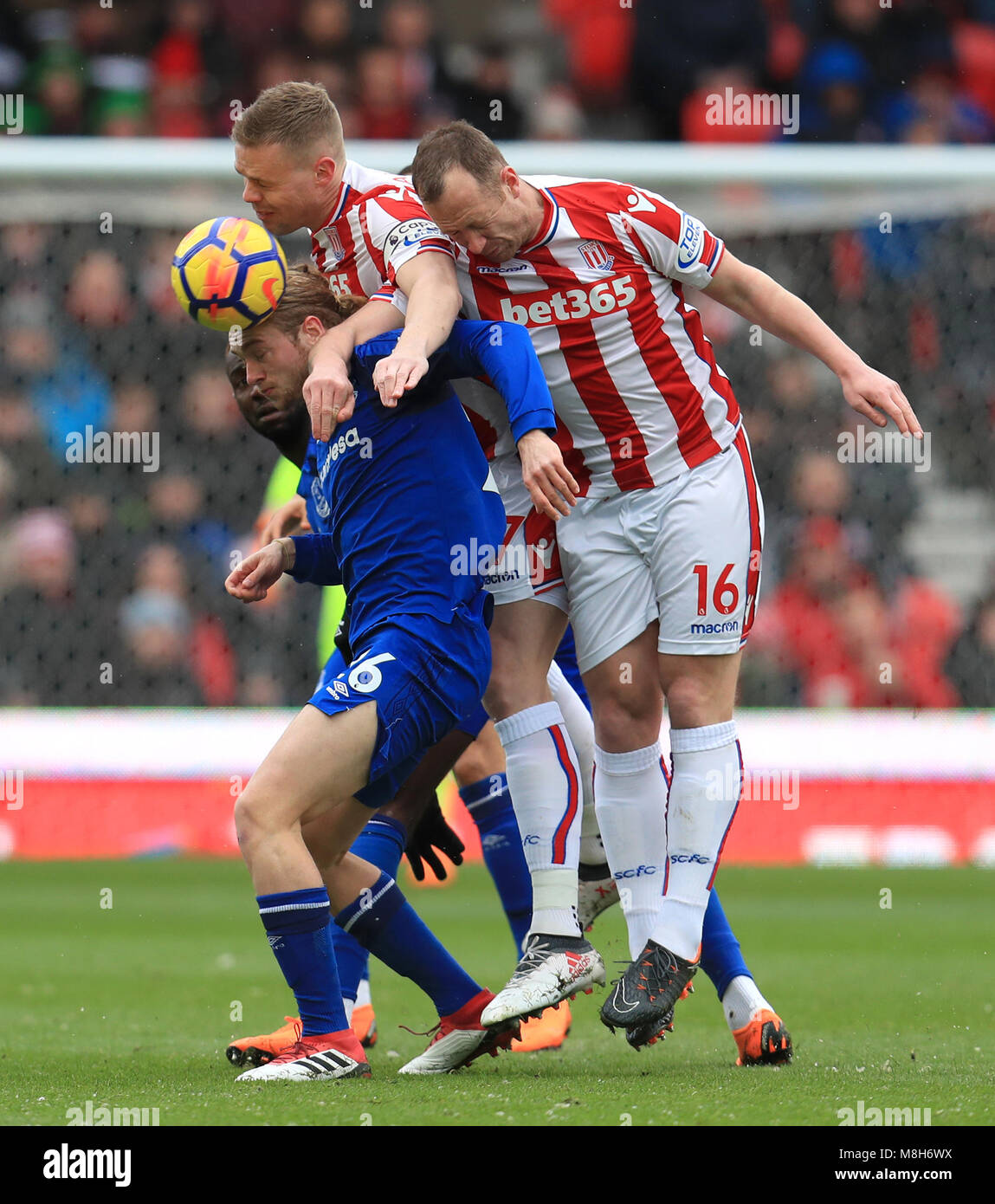 Everton's Tom Davies (left) and Stoke City's Ryan Shawcross (centre ...