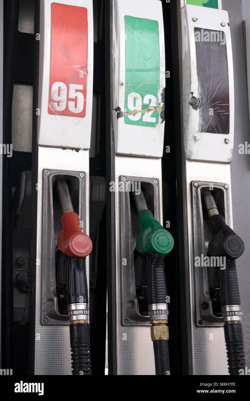 Petrol pump filling hoses for filling in the gas tank Stock Photo - Alamy