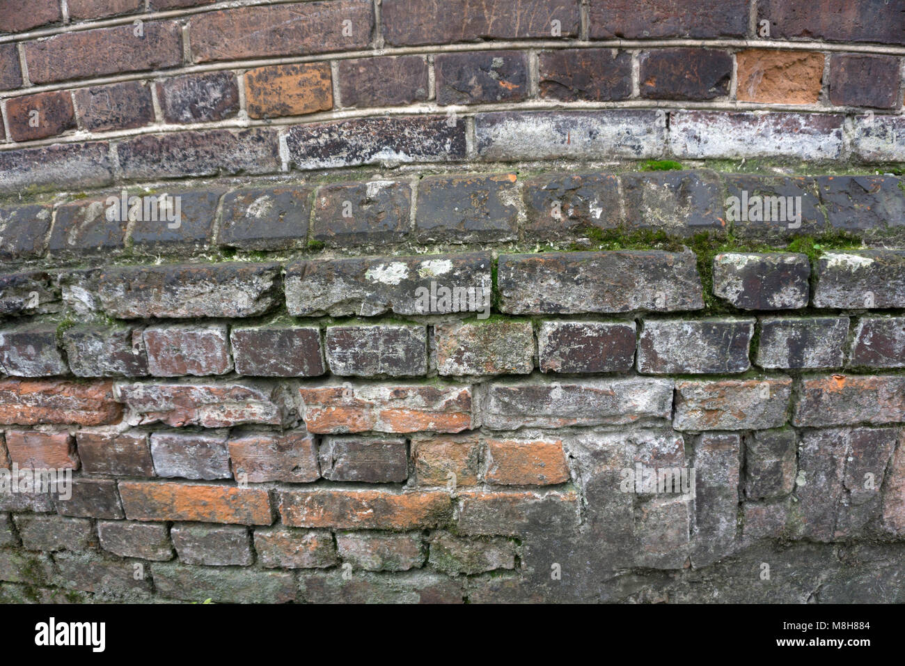Very old pale red brick wall as background or wallpaper. Brick texture ...