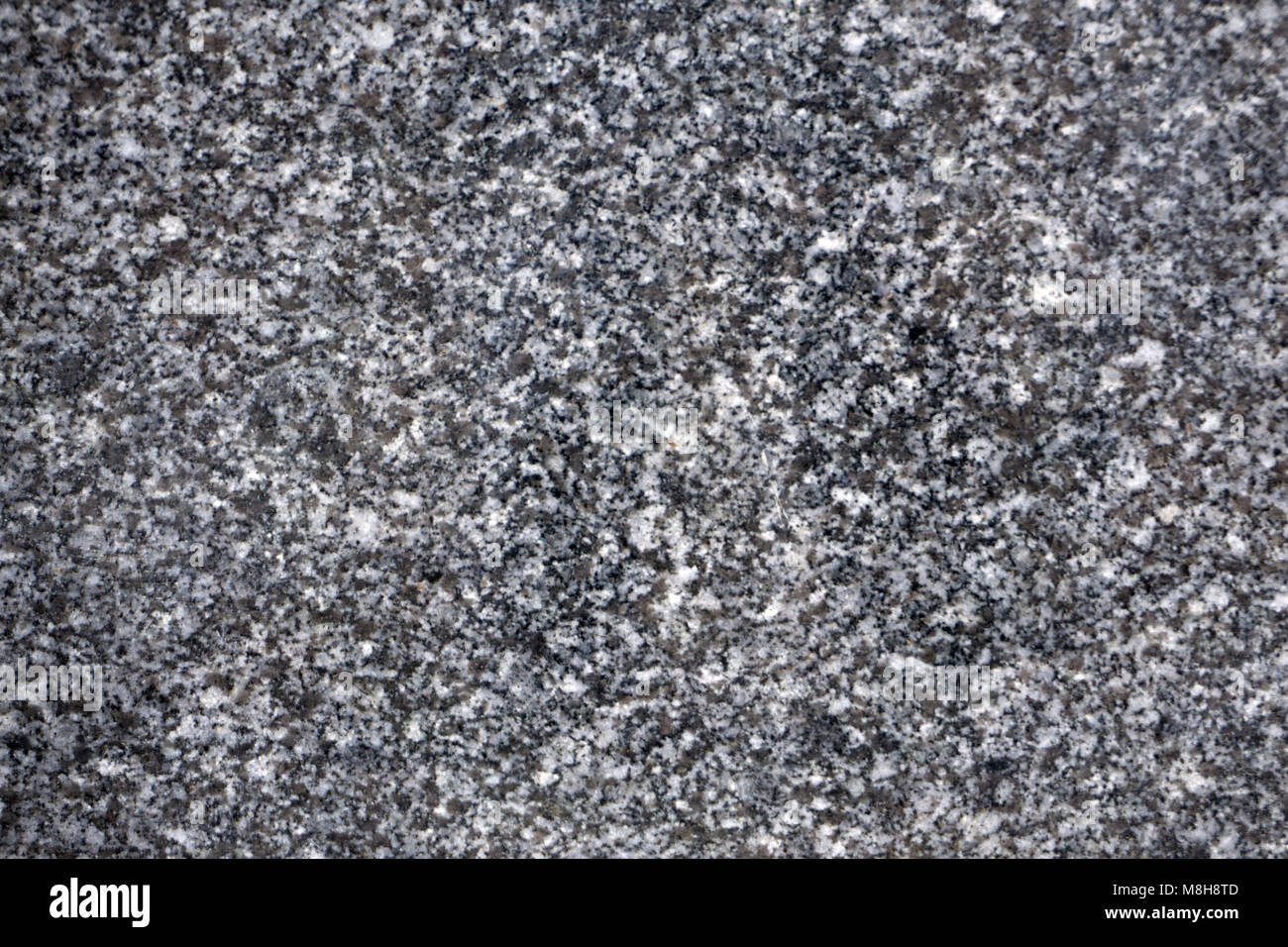 Natural stone grey granite background. Facing material granite texture ...