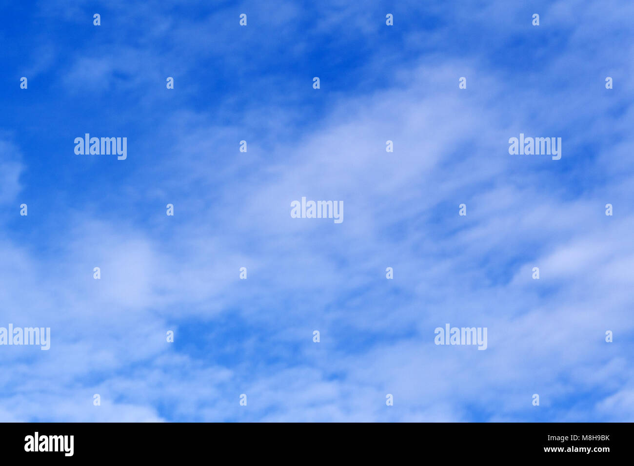 Light blue sky with clouds, may be used as background Stock Photo - Alamy
