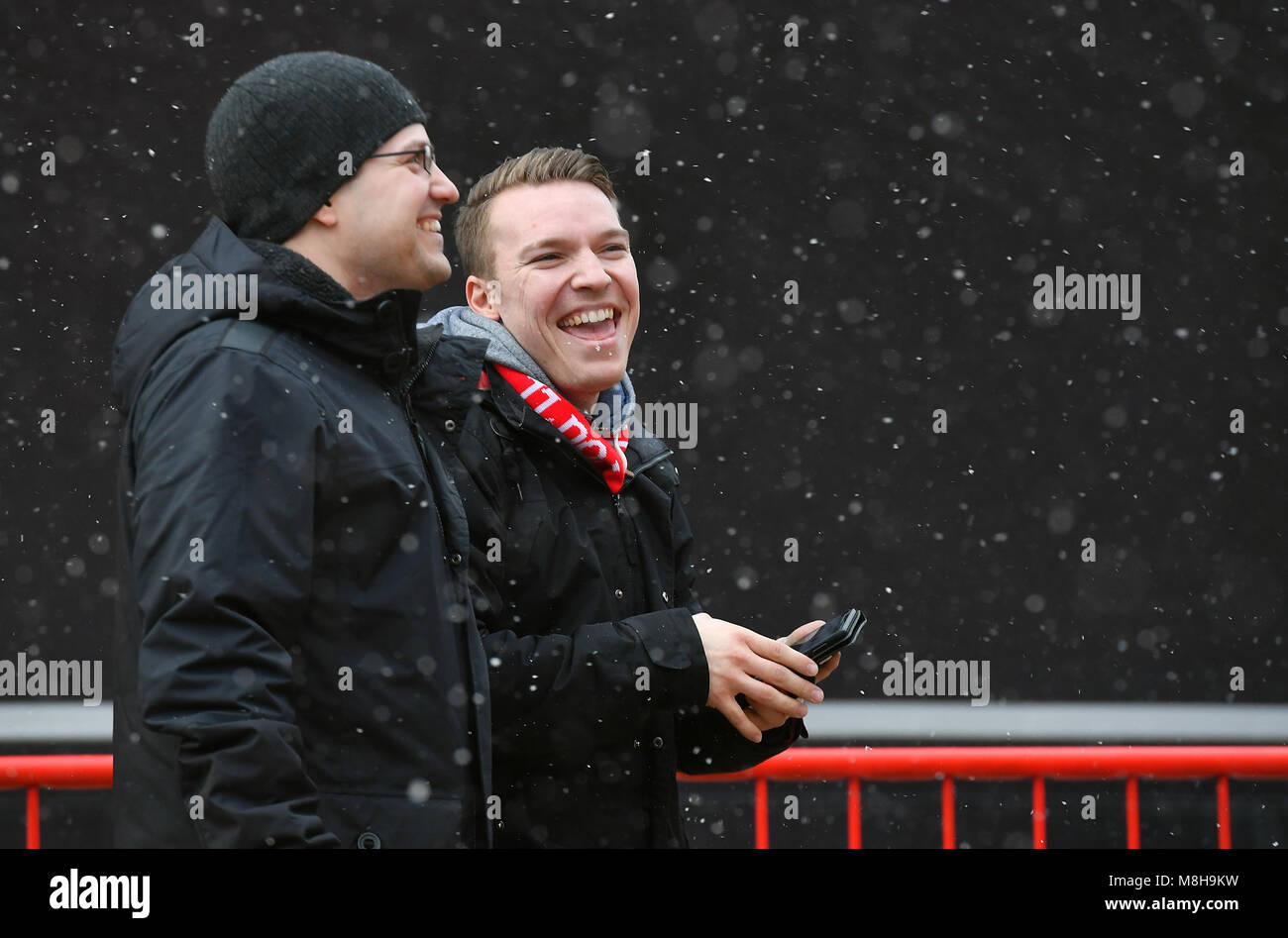 Fans arriving at the ground for the Premier League match at Anfield ...