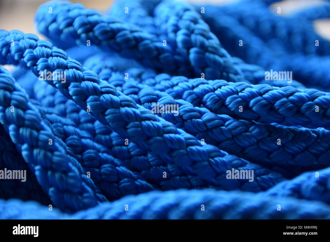 Abstract look of a blue Nylon rope Stock Photo - Alamy
