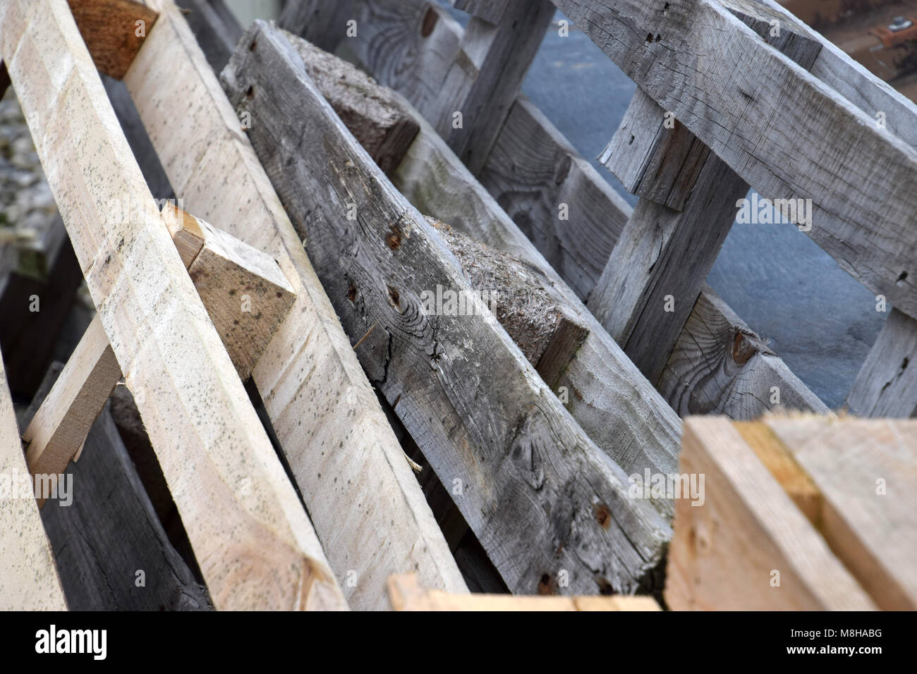 Fragment of the wooden pallets. Stack of wooden pallets. Wooden pallets ...