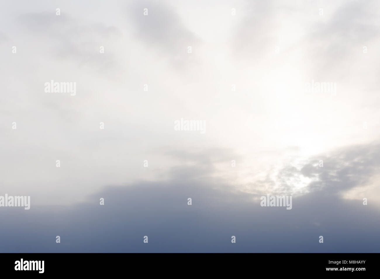 the sun disappears behind the clouds Stock Photo - Alamy