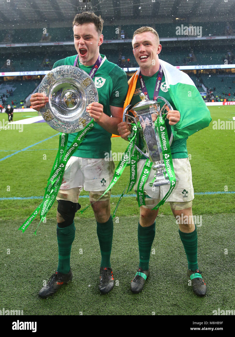 Ireland's James Ryan and Dan Leavy celebrate with the trophy after ...