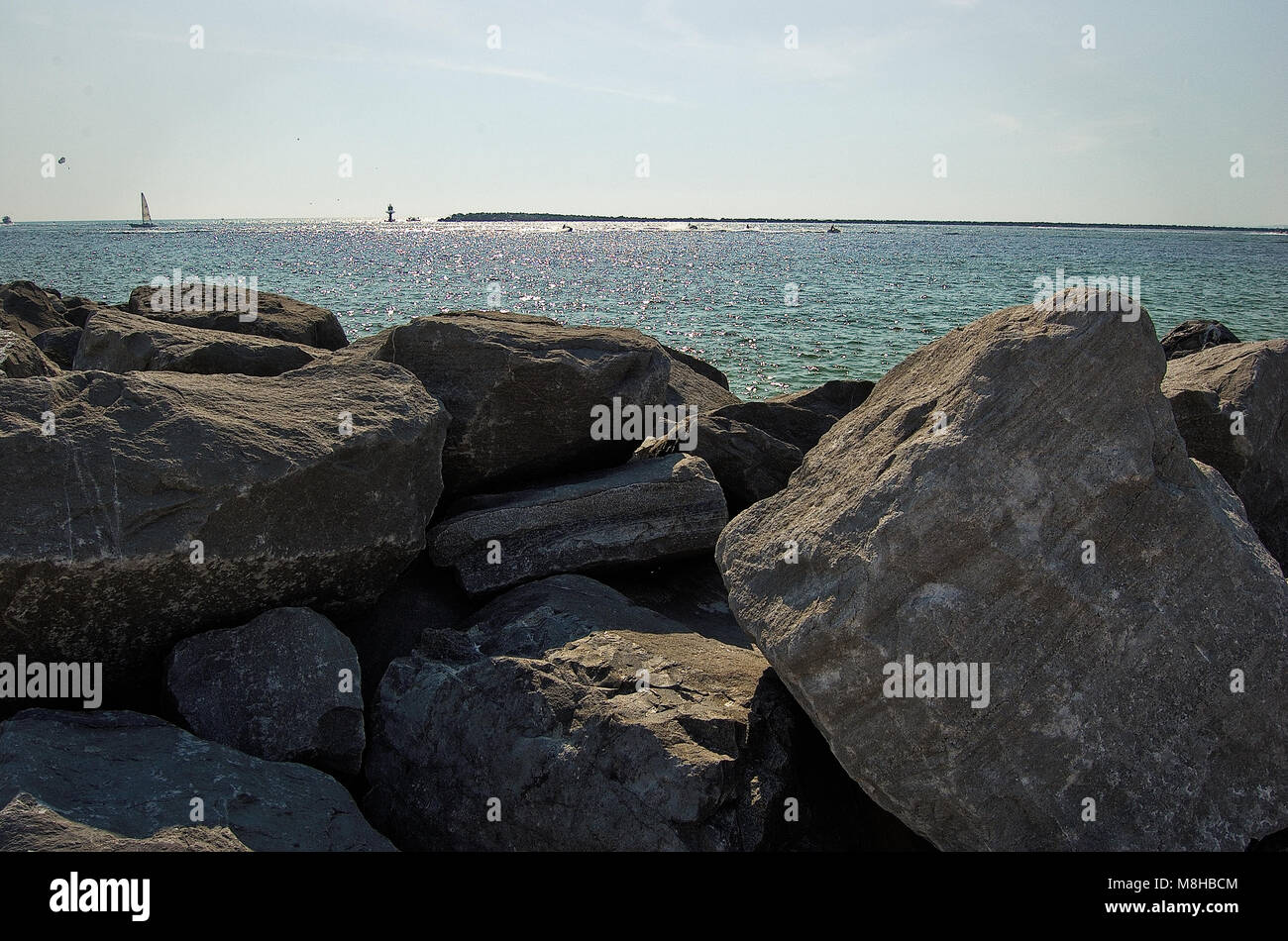 A tide breaker wall on the white sand beach shore of Florida Stock ...