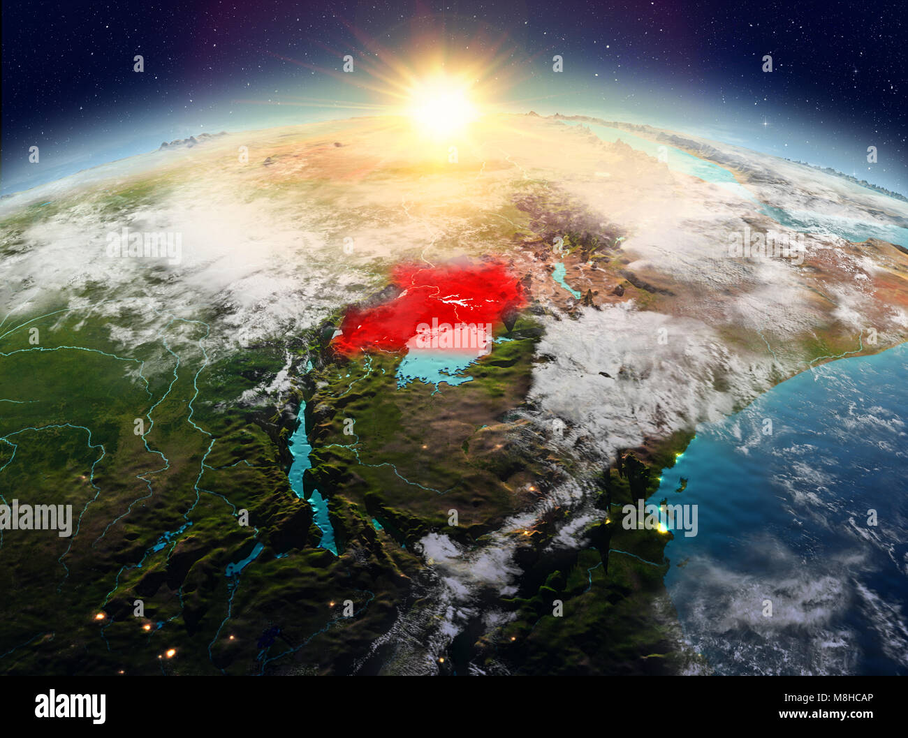 Satellite view of Uganda highlighted in red on planet Earth with clouds during sunrise. 3D ...