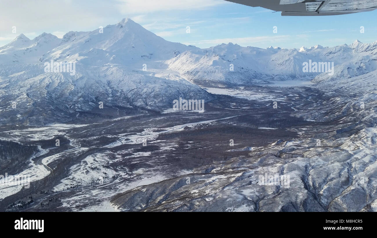 Iliamna in January. Iliamna rises above braided rivers and frozen ...