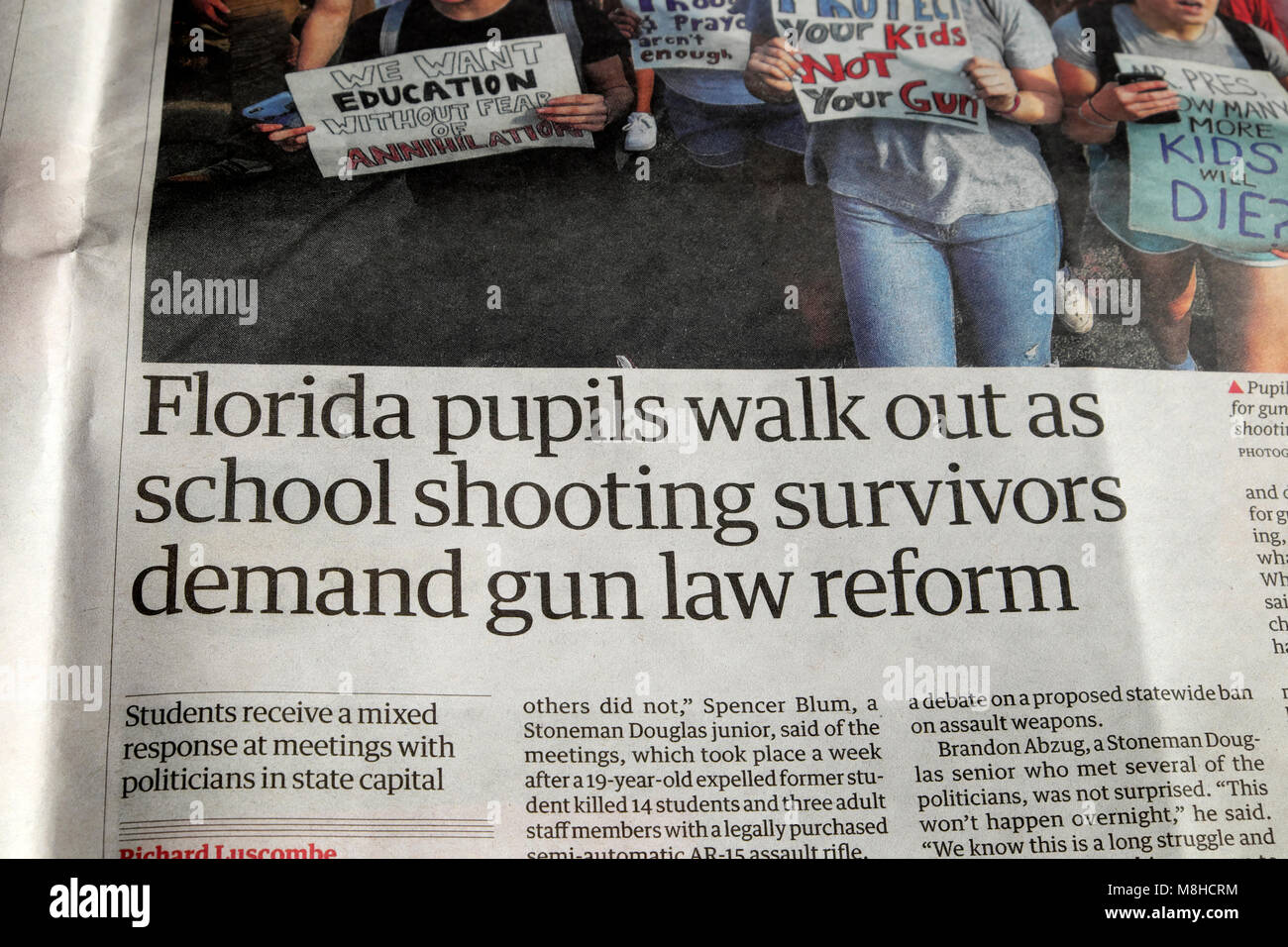 Guardian newspaper headline US article "Florida pupils walk out as ...