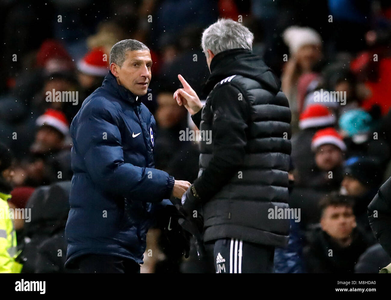 Manchester United manager Jose Mourinho (right) and Brighton & Hove ...