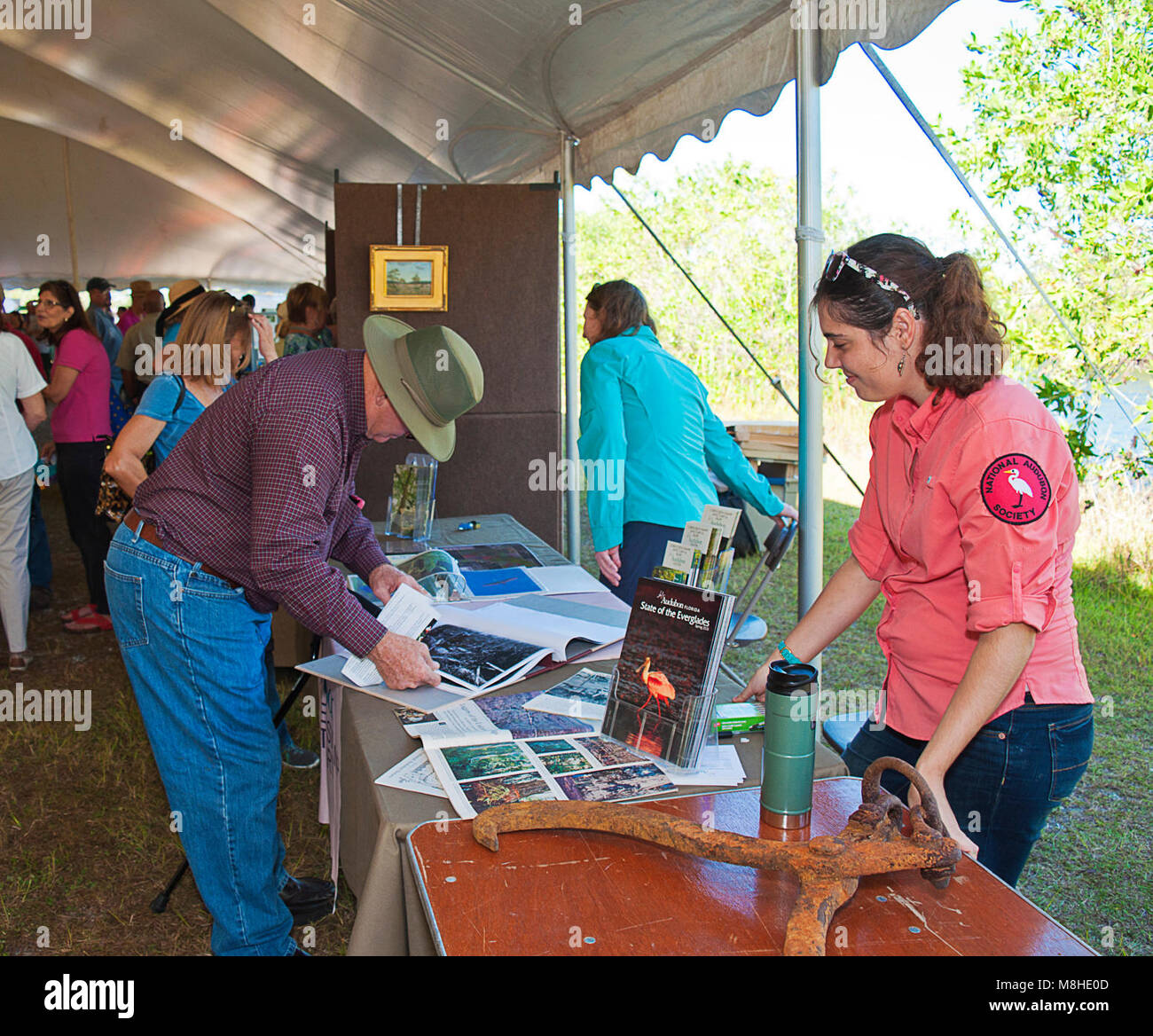 Lynwood examines old Life and Look magazines about the logging Stock ...