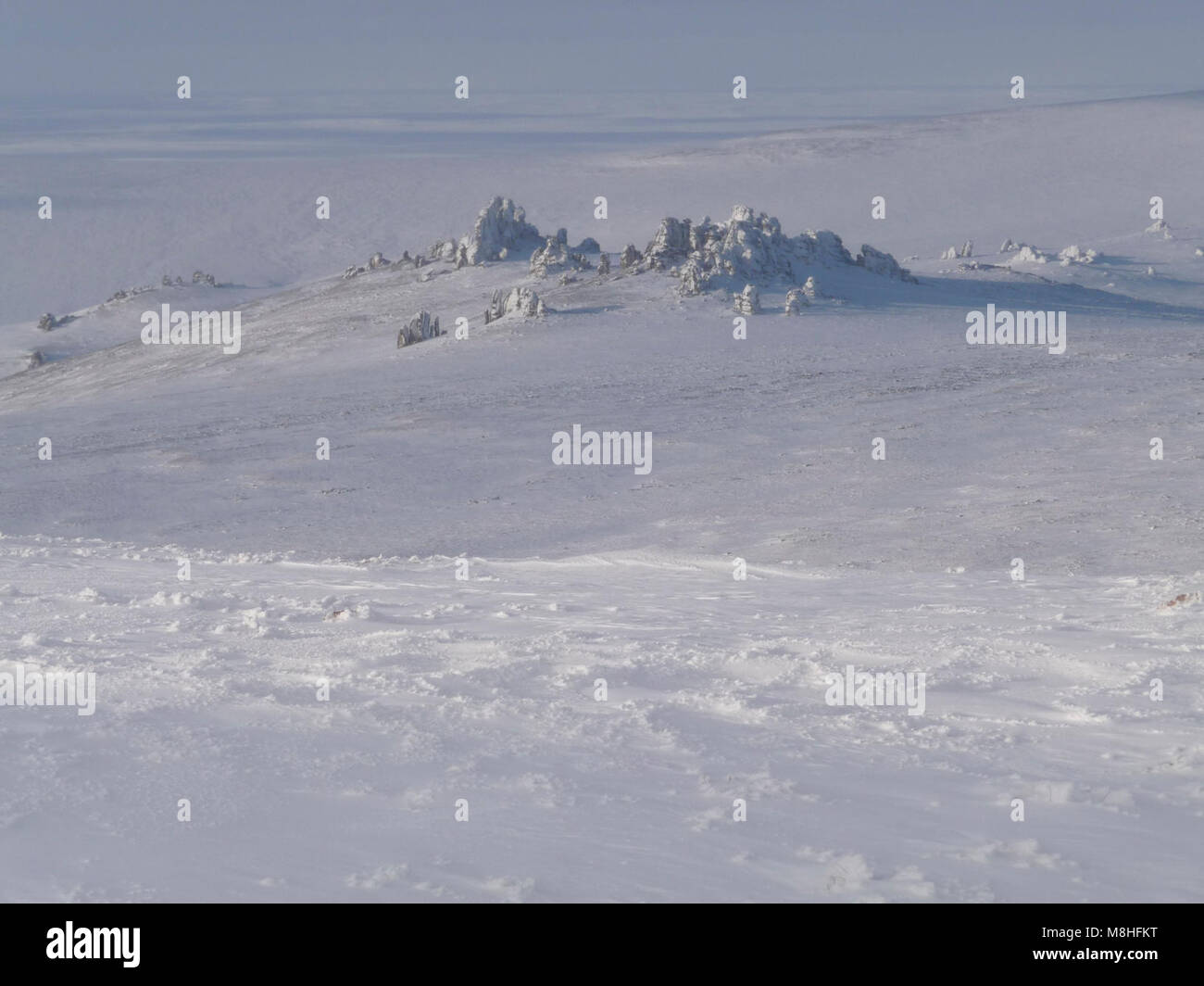 Snowy Tors. The striking tors of Hot Springs Valley are cloaked in ...