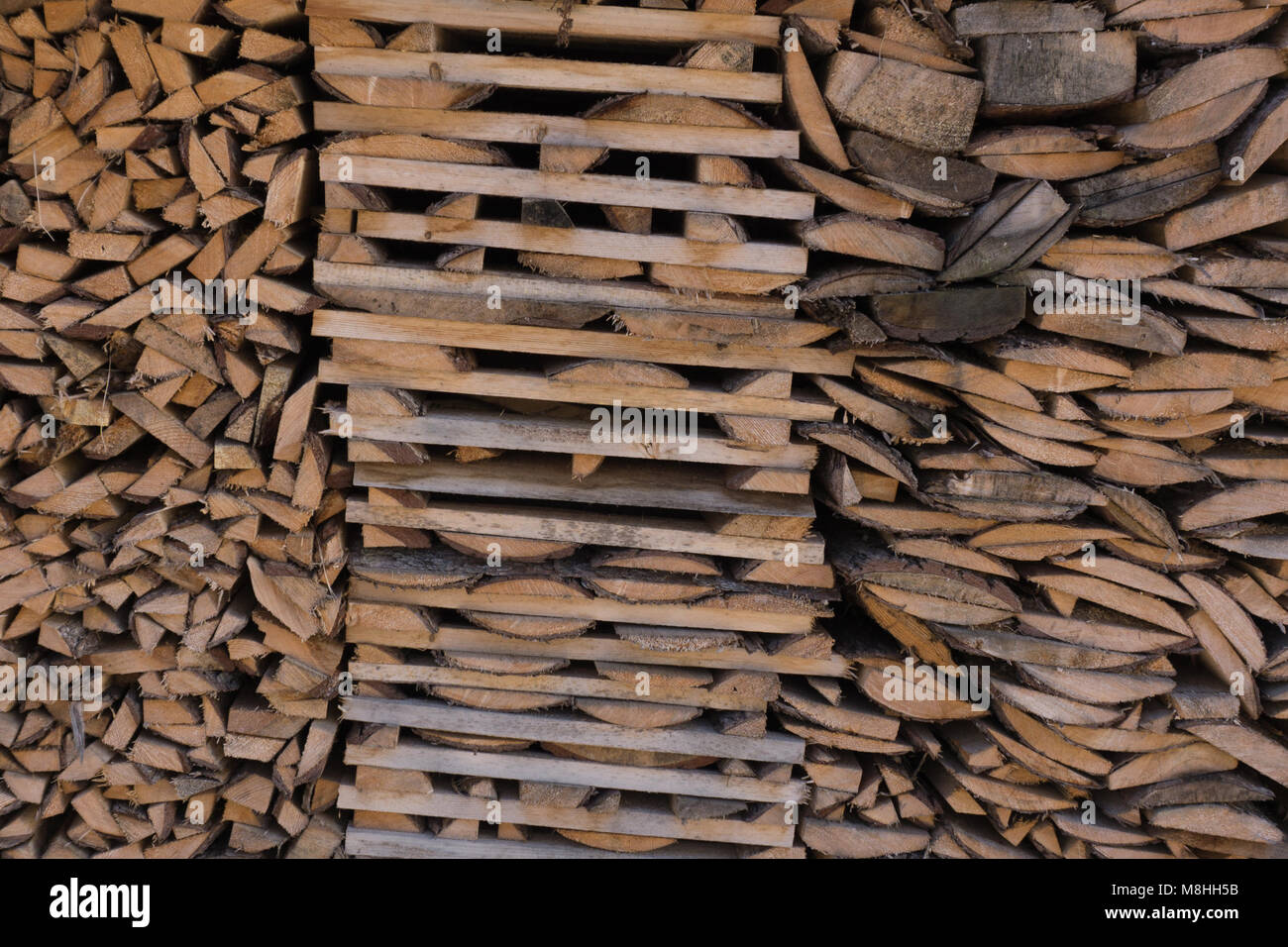 Stacked lumber background rough sorted stacked stack Stock Photo - Alamy