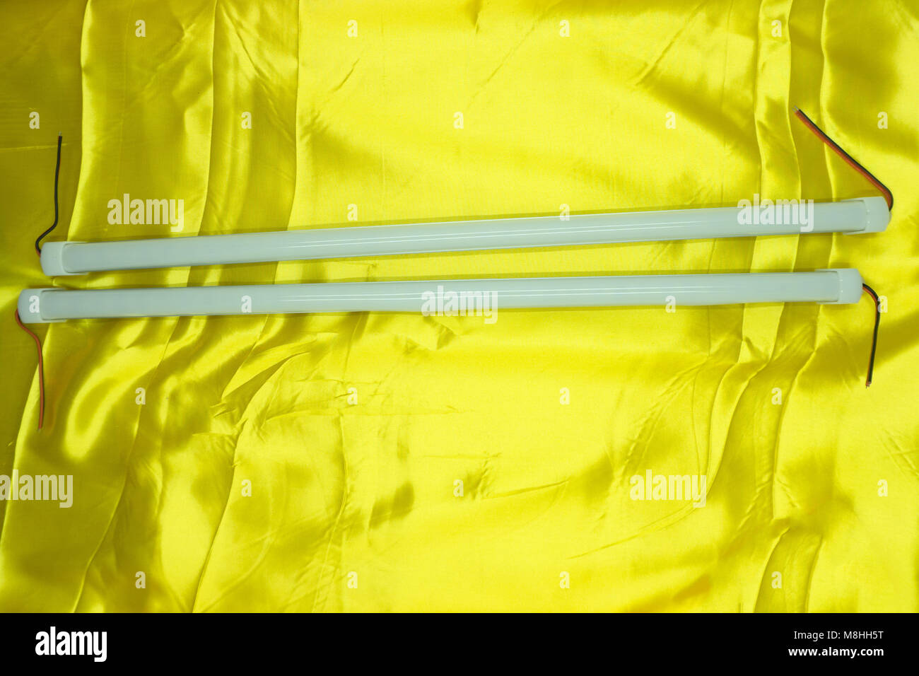 LED fluorescent light tubes on black background. Professional lighting ...