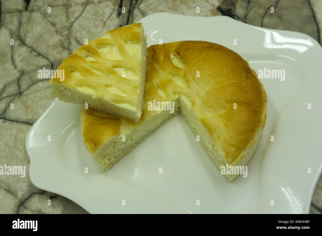 Cheesecake isolated on white background yellow yummy Stock Photo - Alamy