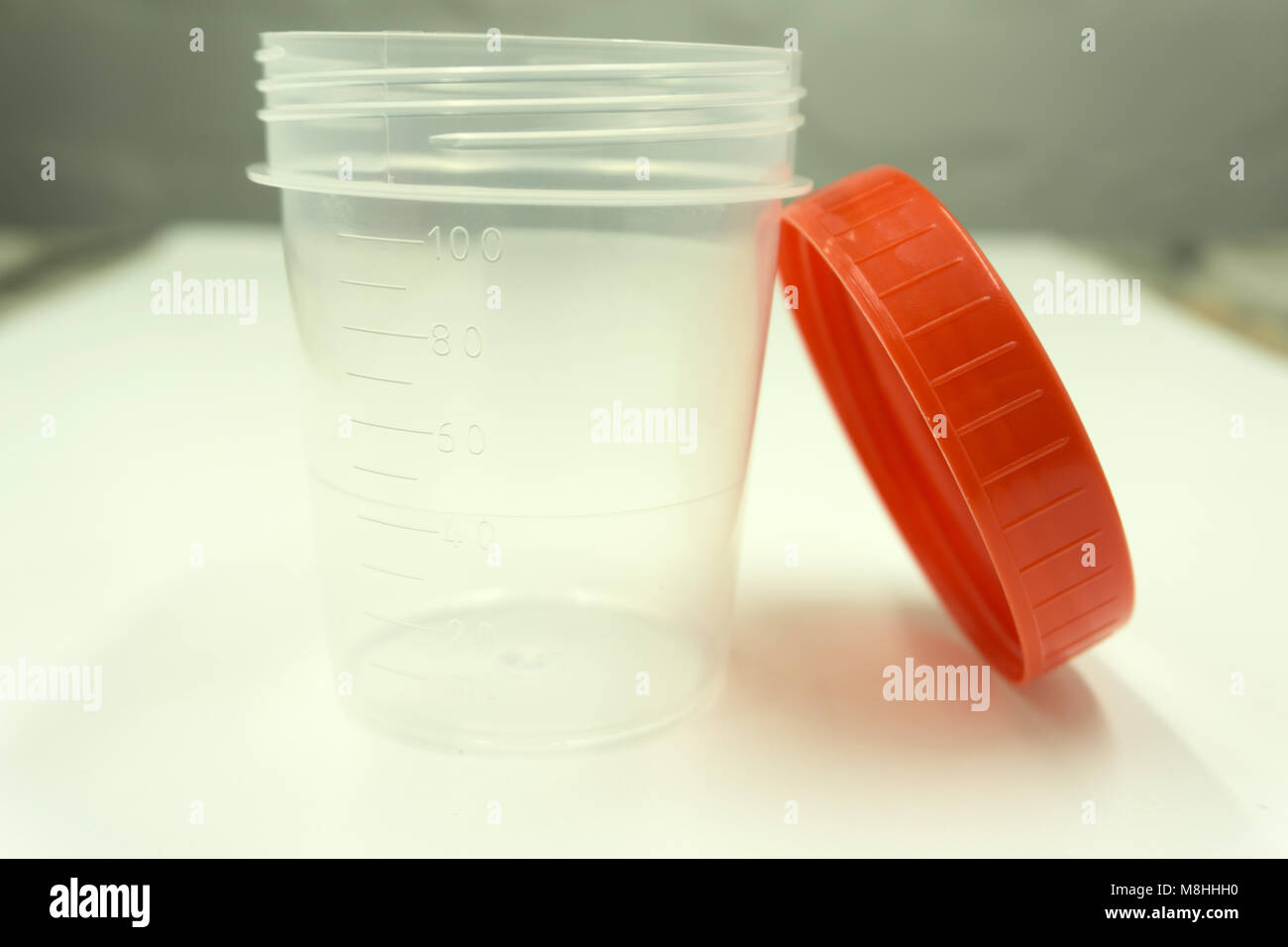Disposable jars for collection of urine for analysis Stock Photo - Alamy
