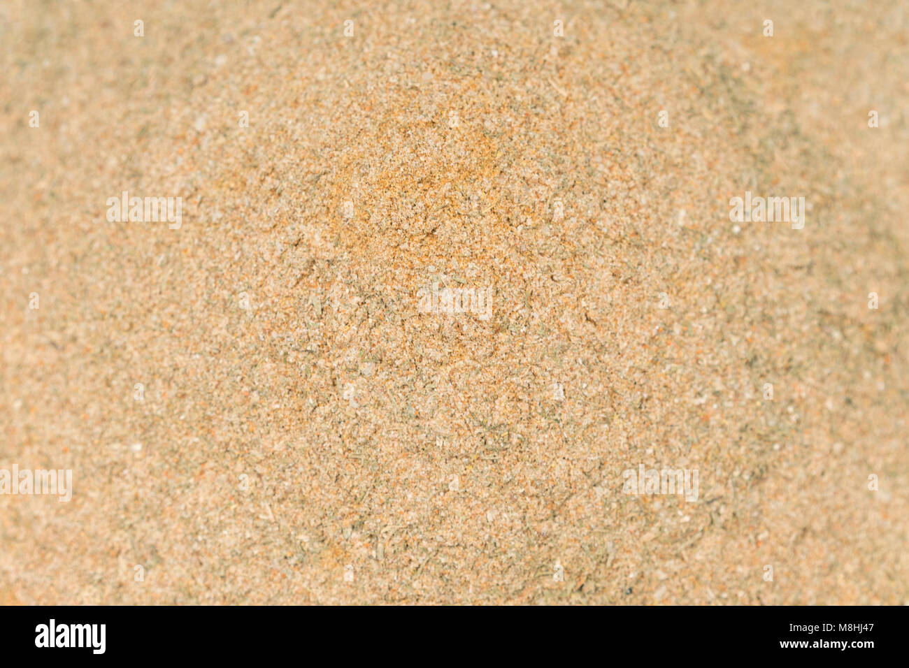 Brown background of ground pepper Stock Photo - Alamy