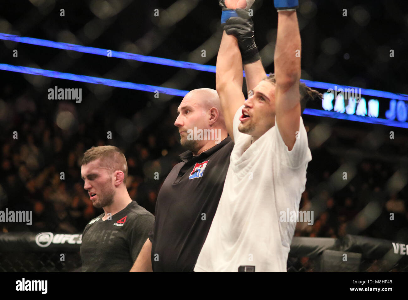 Kajan Johnson (Blue Corner) defeats Stevie Ray (Red Corner) via judges ...