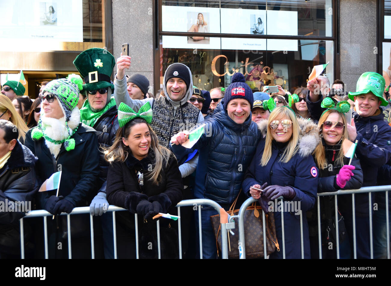 Crowd having a good time on parade route Stock Photo - Alamy