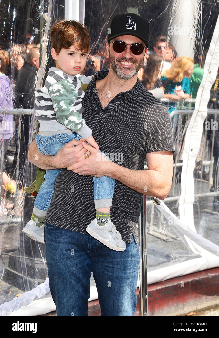 Reid Scott and son arrives at the premiere of Warner Bros. Pictures and ...