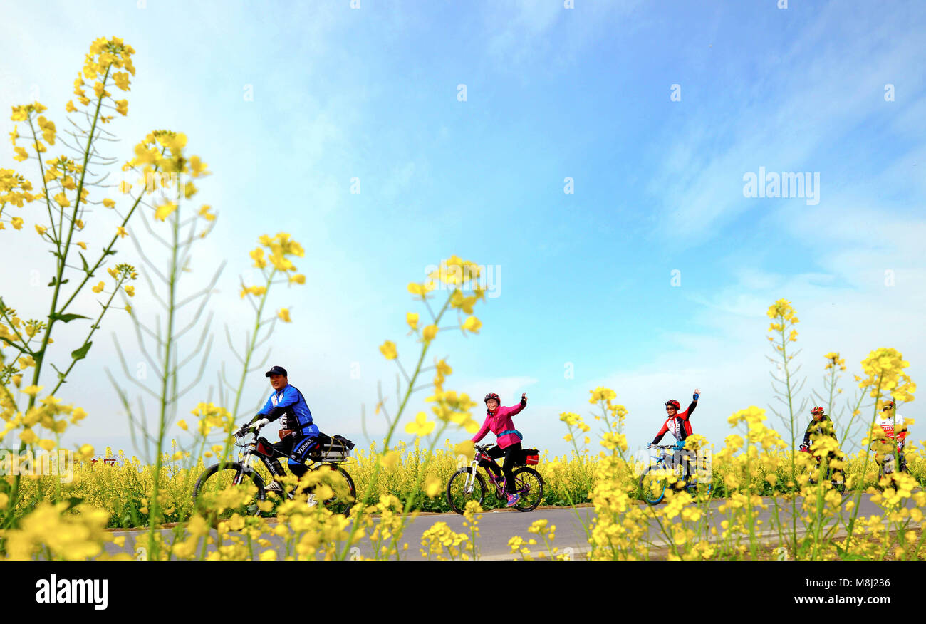 Beijing, China's Sichuan Province. 11th Mar, 2018. Visitors ride ...