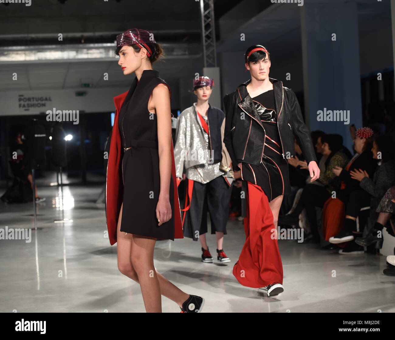 Lisbon, Portugal. 17th Mar, 2018. Models present creations of the brand ...
