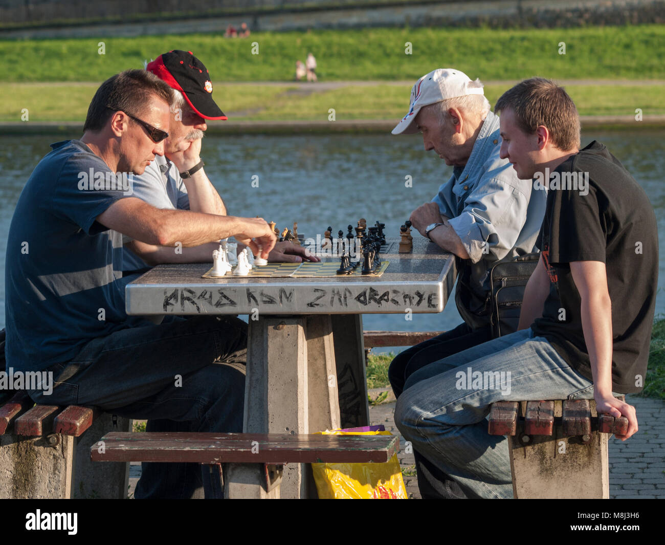Men playing chess Stock Photo - Alamy