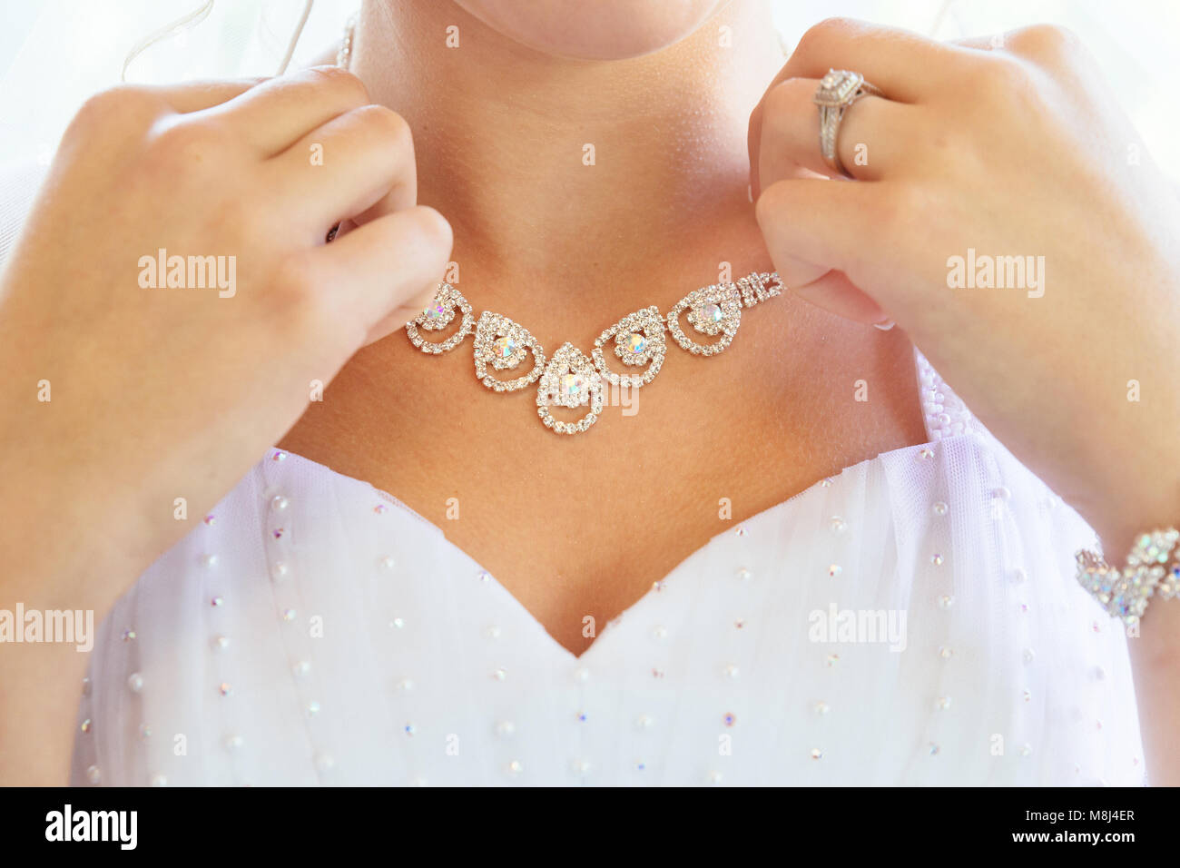 necklace on the neck of bride bride wedding jewelry Stock Photo - Alamy