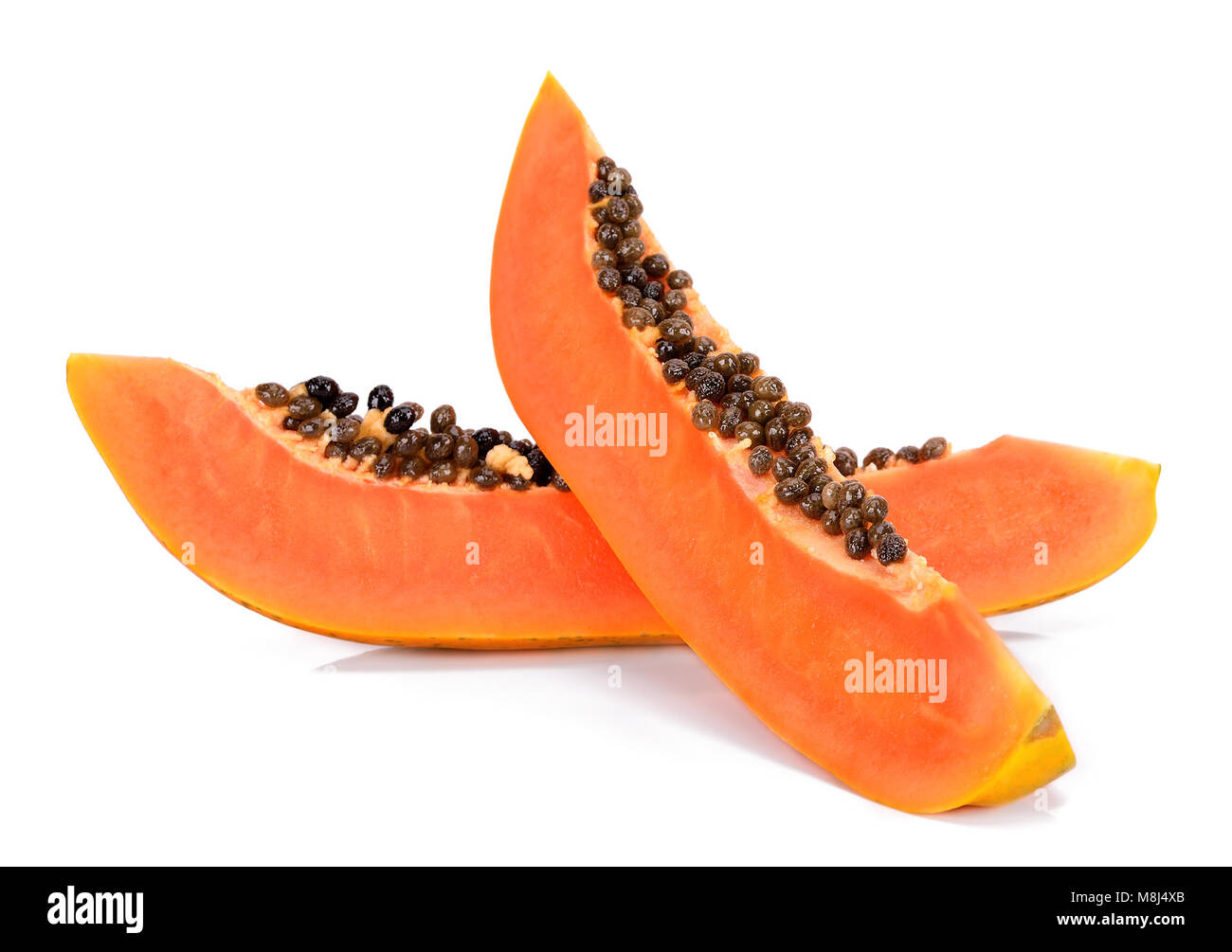 Slice of papaya isolated on white background Stock Photo - Alamy