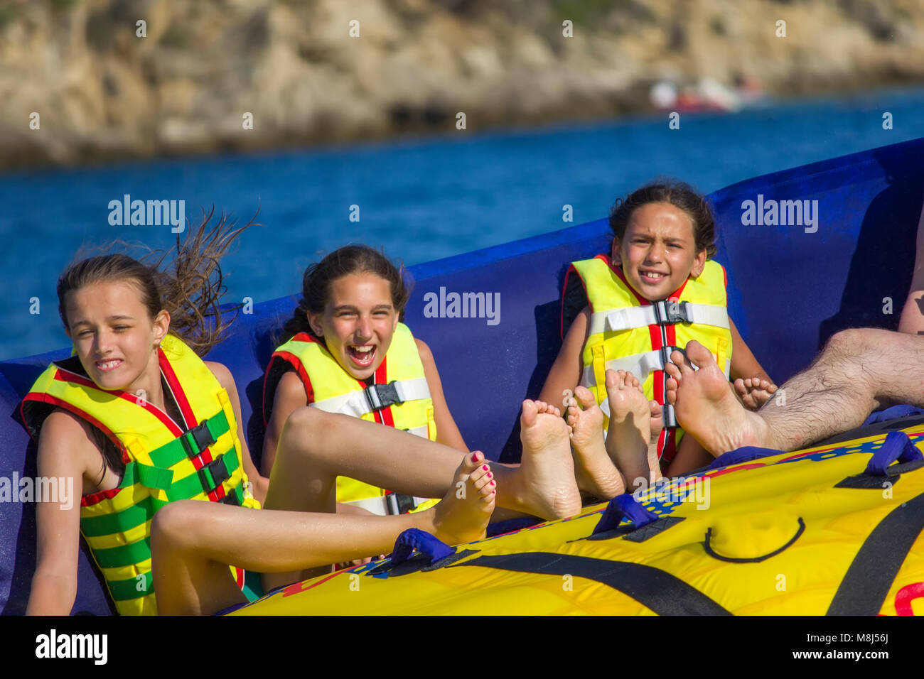Family water sport adventure on the sea Stock Photo - Alamy