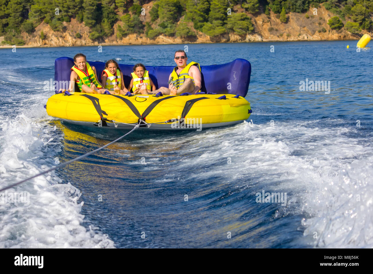 Family water sport adventure on the sea Stock Photo - Alamy